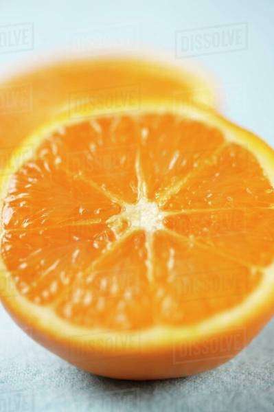 A halved orange - Stock Photo - Dissolve