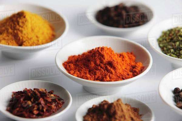 Various exotic spices in porcelain dishes - Royalty-free Stock Photo ...