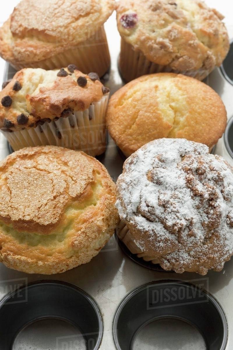 Assorted muffins in muffin tin (overhead view) - Royalty-free Stock ...