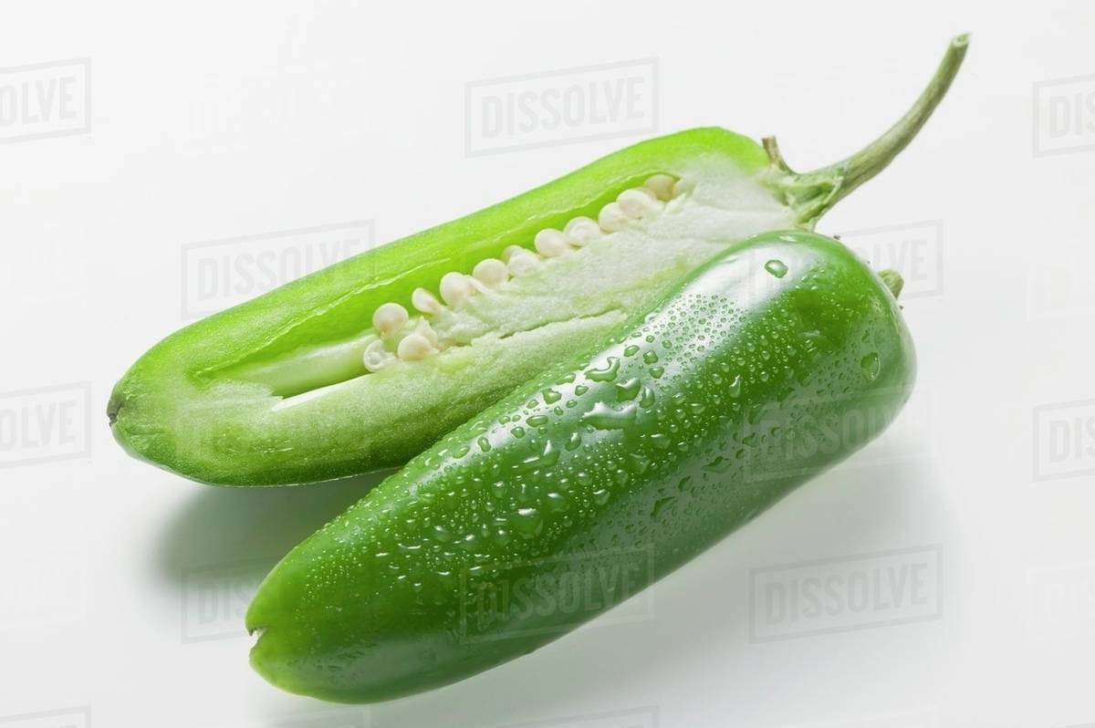 Green chilli with drops of water, halved - Royalty-free Stock Photo ...