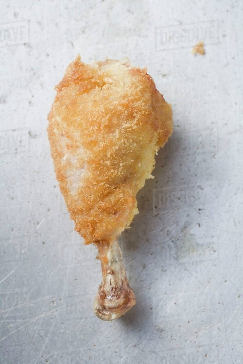 Breaded chicken leg - Stock Photo - Dissolve