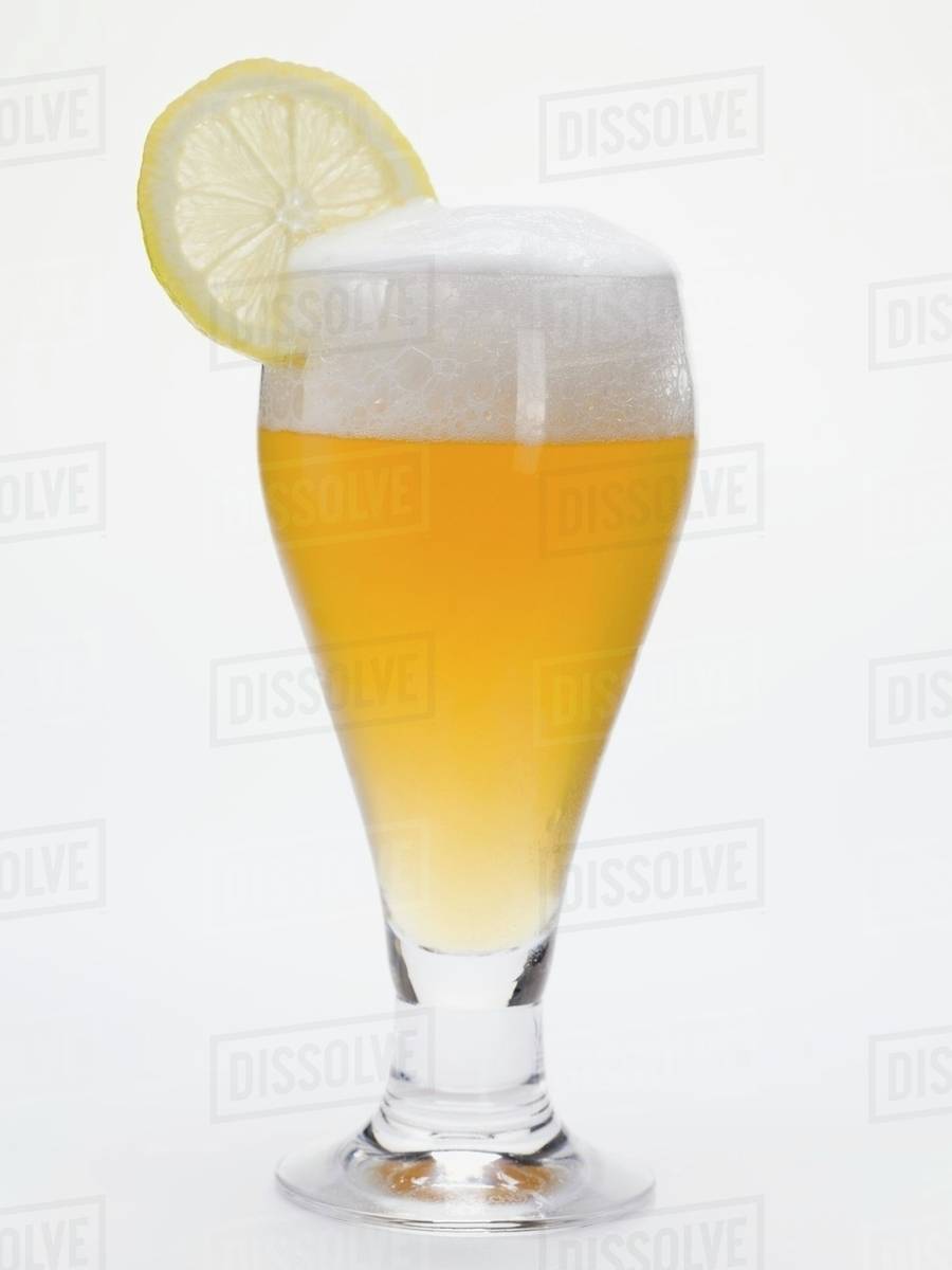 Glass of shandy with slice of lemon (UK) - Royalty-free Stock Photo ...