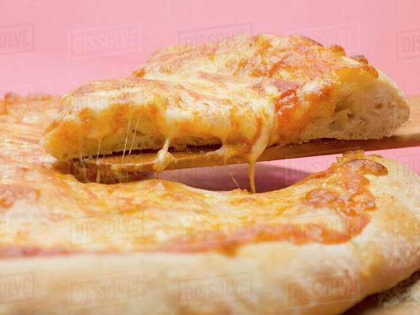 Pizza Margherita (tomato & cheese pizza) with slice on server - Stock ...
