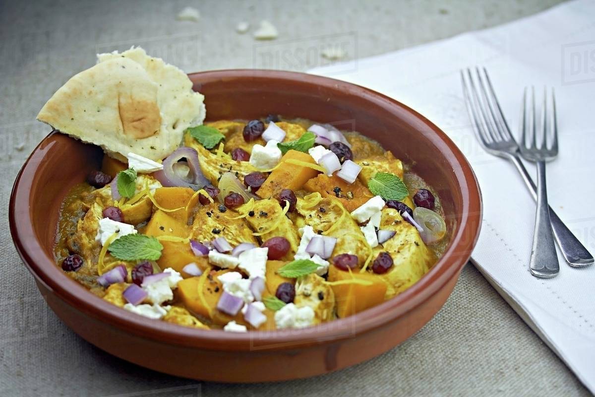 Chicken with pumpkin, feta cheese and unleavened bread (Morocco ...