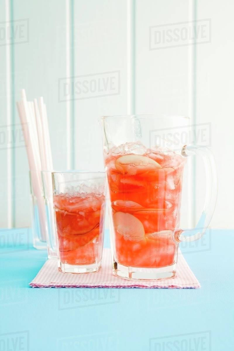 Iced tea in a jug and a glass - Royalty-free Stock Photo | Dissolve