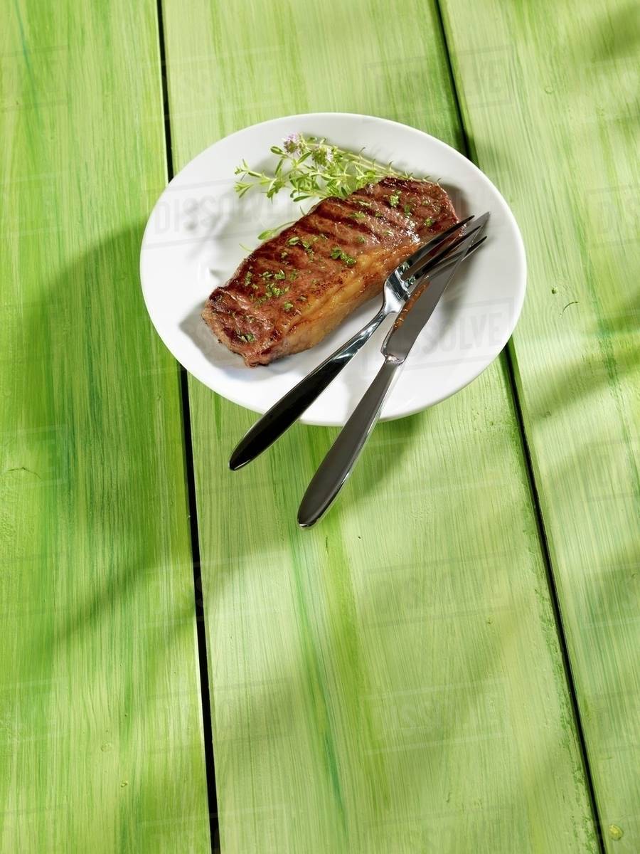 Grilled rump steak with cress - Royalty-free Stock Photo | Dissolve