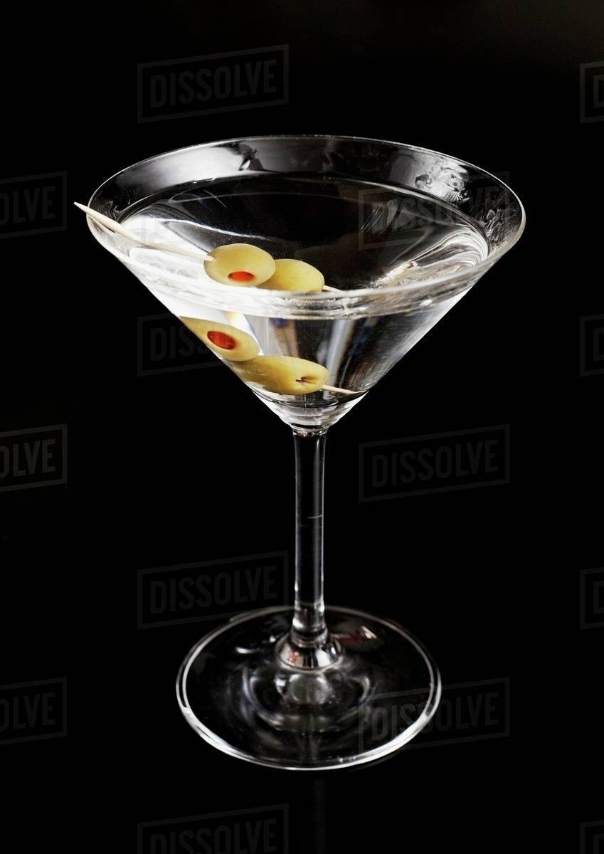 A martini against a black background - Stock Photo - Dissolve