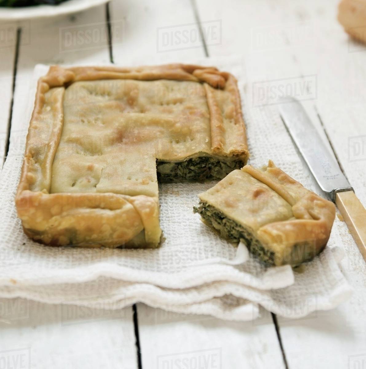 Vegetable cake with spinach, sliced - Royalty-free Stock Photo | Dissolve