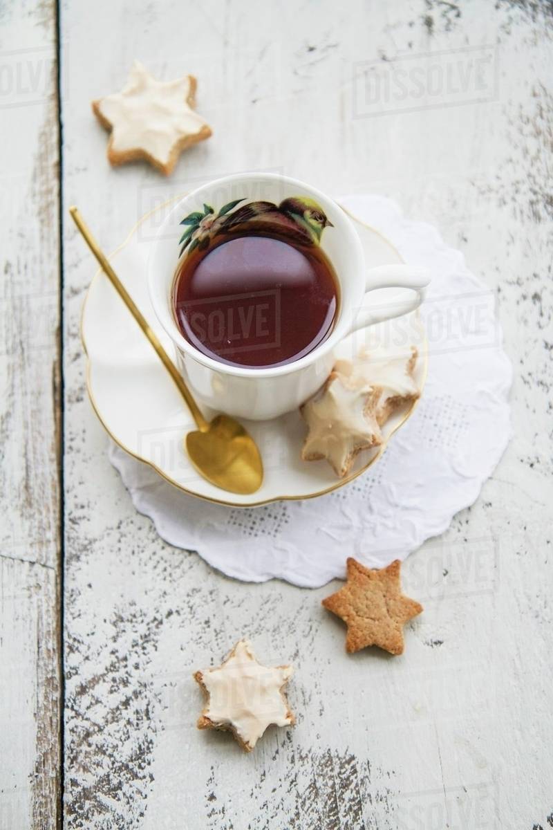 Cinnamon stars and tea - Royalty-free Stock Photo | Dissolve