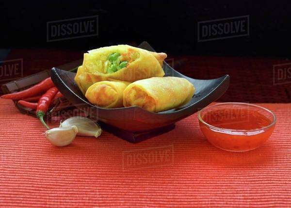 Spring rolls with chilli sauce - Royalty-free Stock Photo | Dissolve
