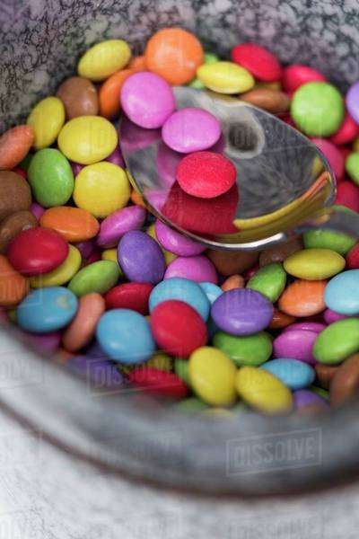 Coloured chocolate beans - Stock Photo - Dissolve