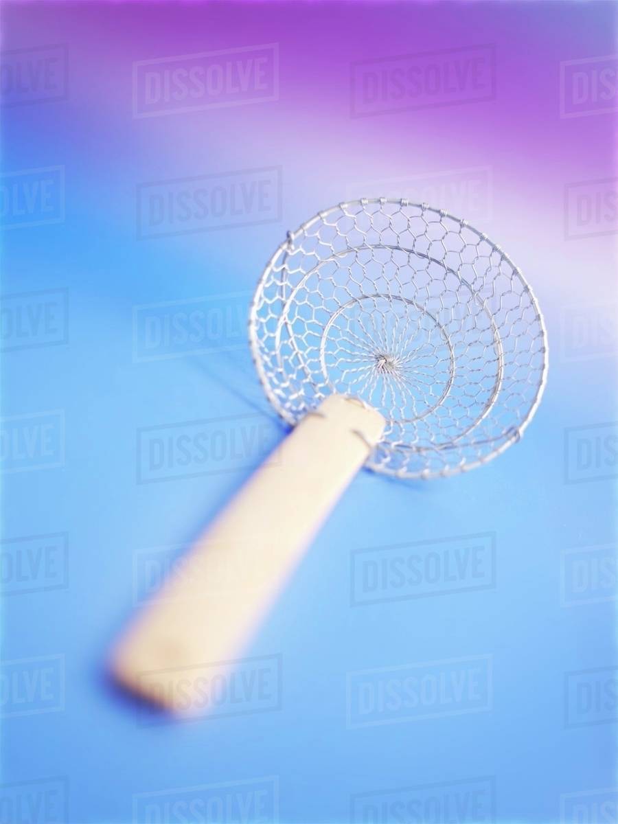 A Chinese fry sieve - Royalty-free Stock Photo | Dissolve