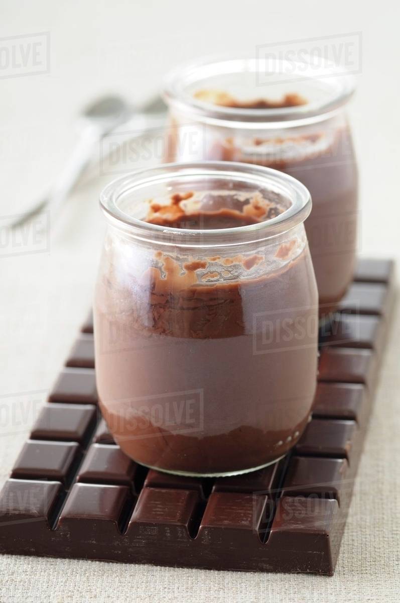 Jars of chocolate pudding - Royalty-free Stock Photo | Dissolve