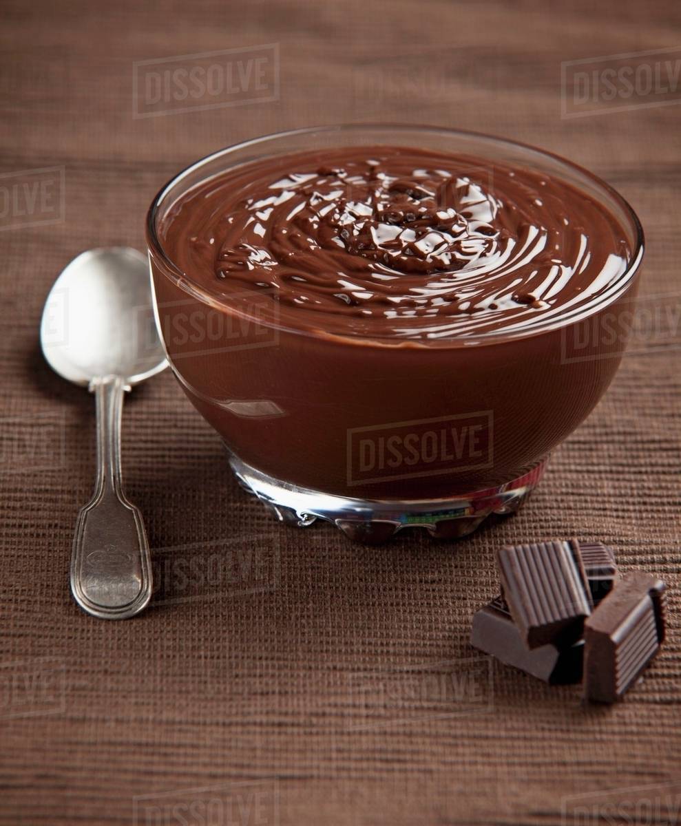 Melted chocolate in a glass bowl - Royalty-free Stock Photo | Dissolve