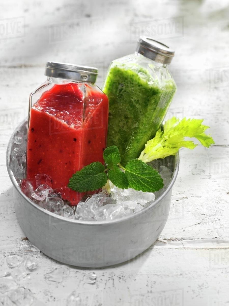 Two different smoothies in a bucket of ice - Royalty-free Stock Photo ...