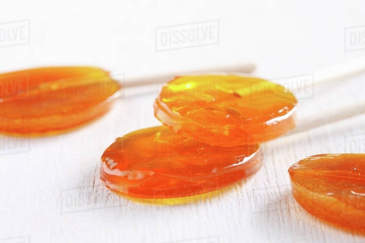 Orange lollies - Royalty-free Stock Photo | Dissolve