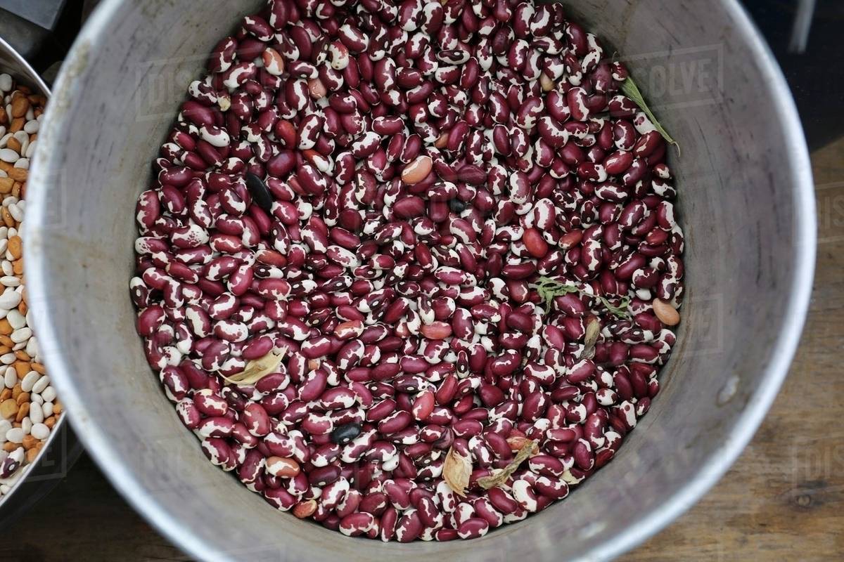 A bucket of cow peas at a market - Royalty-free Stock Photo | Dissolve