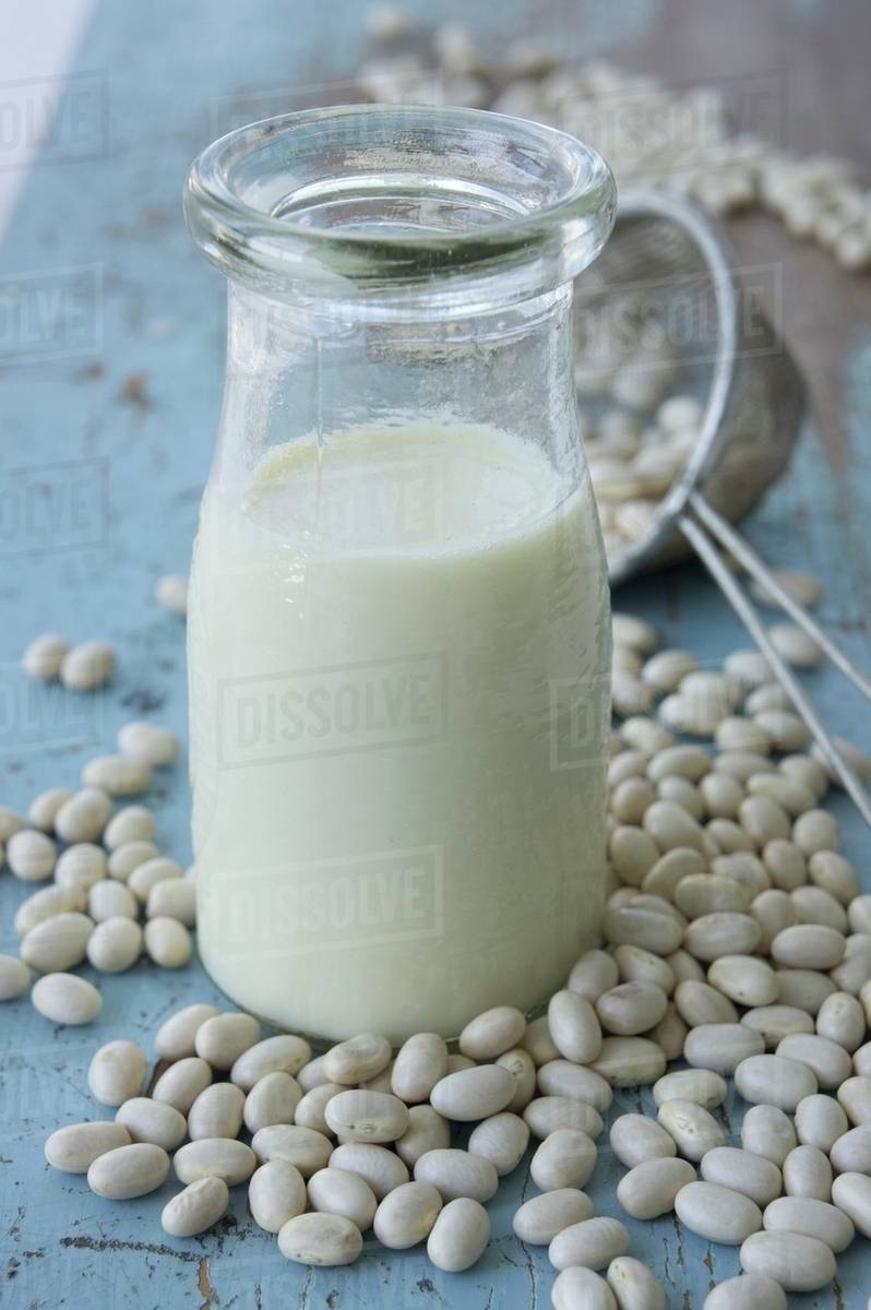 A bottle of soya milk and soya beans - Royalty-free Stock Photo | Dissolve