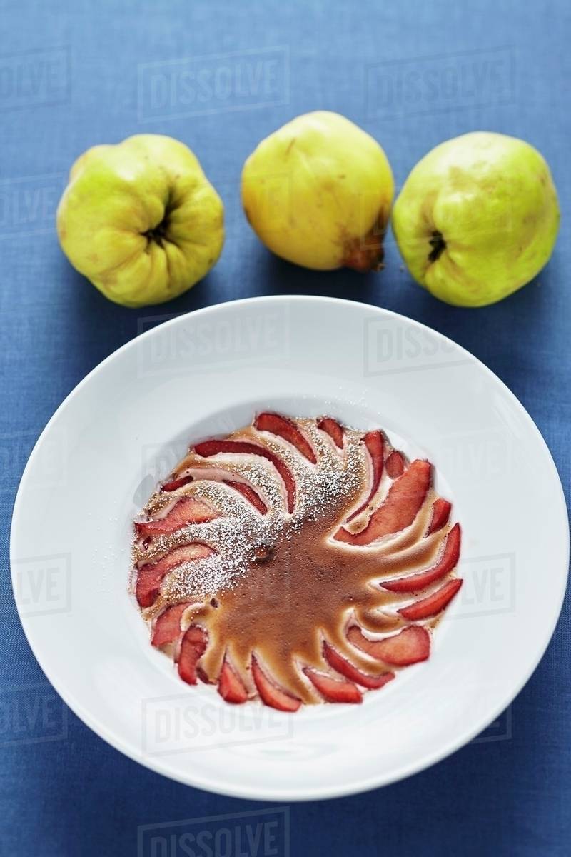 Quince gratin with icing sugar - Royalty-free Stock Photo | Dissolve