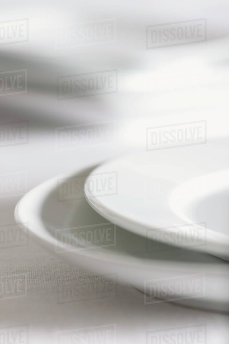 Stacked White Plates - Royalty-free Stock Photo | Dissolve