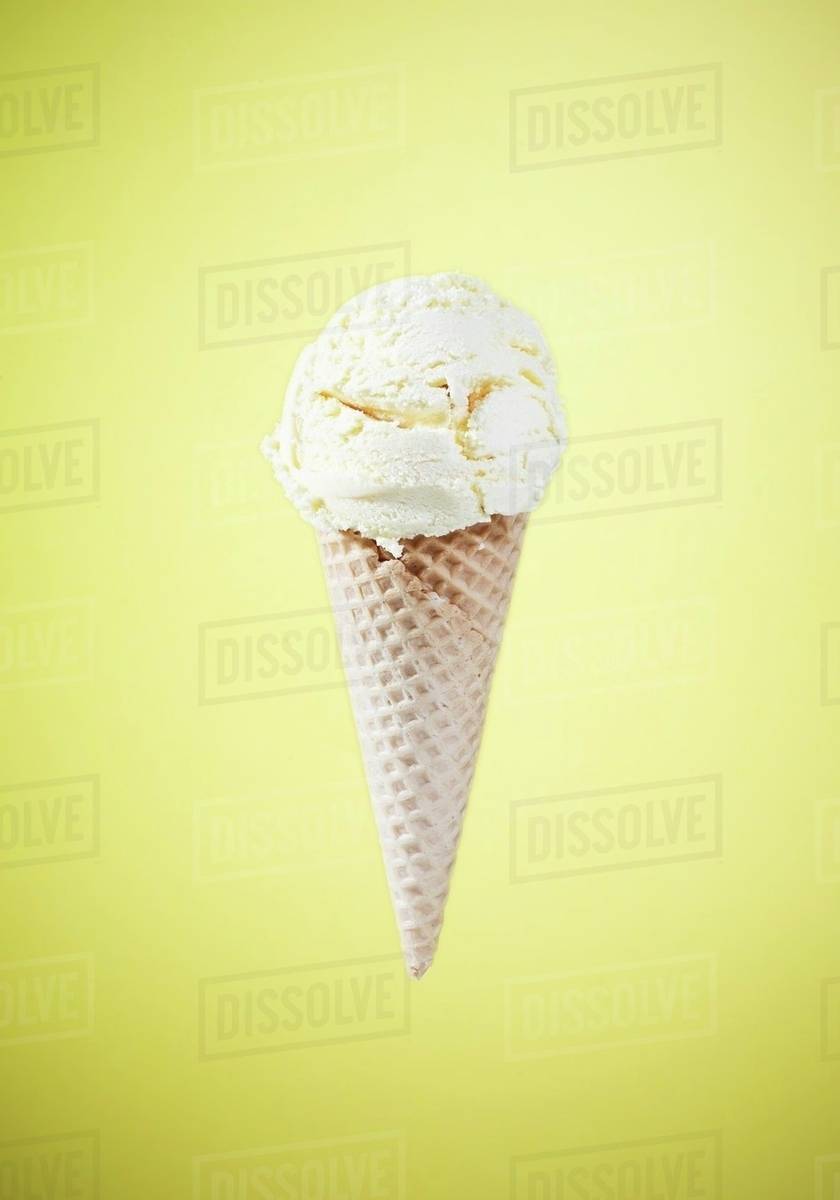 Close Up of a Vanilla Ice Cream Cone - Royalty-free Stock Photo | Dissolve