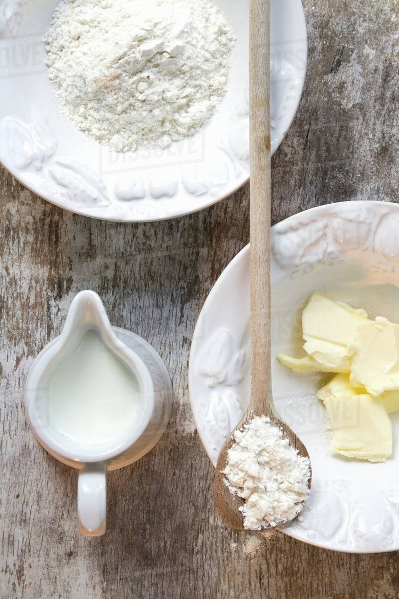 Baking ingredients: flour, butter and milk - Royalty-free Stock Photo ...