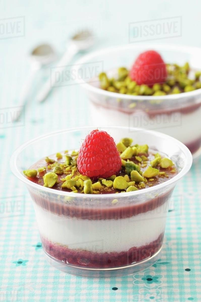Raspberry tiramisu with pistachios - Royalty-free Stock Photo | Dissolve
