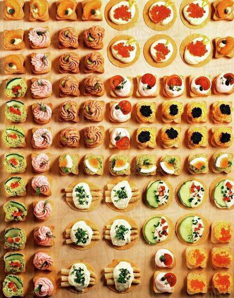 Lots of different canapes in rows - Royalty-free Stock Photo | Dissolve