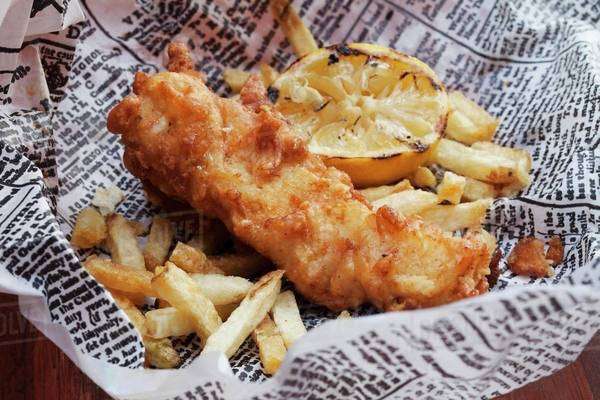 Fish and Chips with Lemon on Newspaper - Royalty-free Stock Photo ...