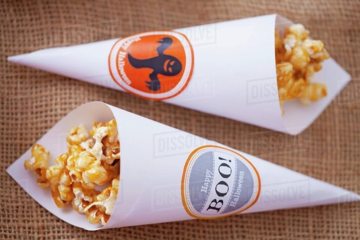 Caramelised popcorn in paper cones for Halloween - Royalty-free Stock ...