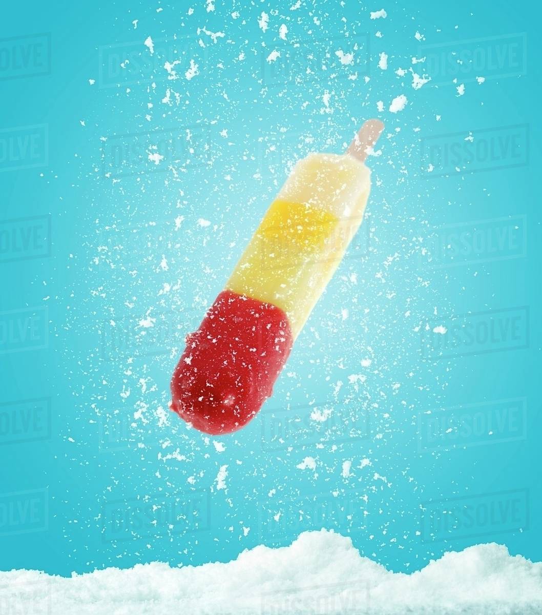 A fruit ice lolly with snow - Royalty-free Stock Photo | Dissolve