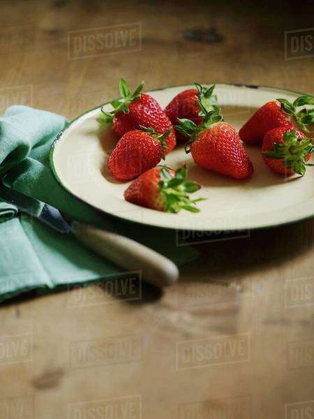 Strawberries on a plate - Royalty-free Stock Photo | Dissolve