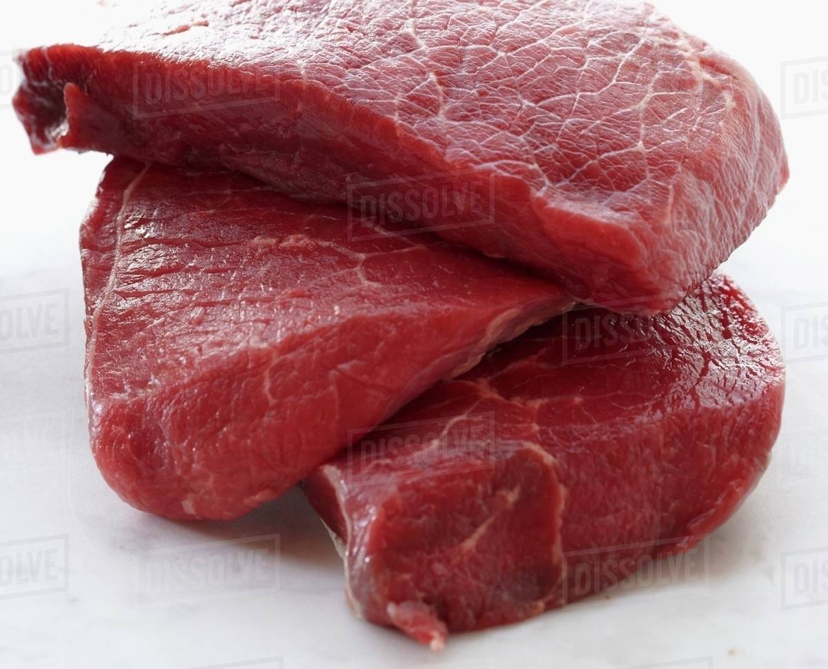 Raw Beef Stacked - Stock Photo - Dissolve