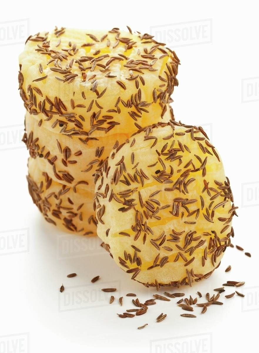 A roll of handmade Harzer (sour milk cheese) with caraway seeds ...