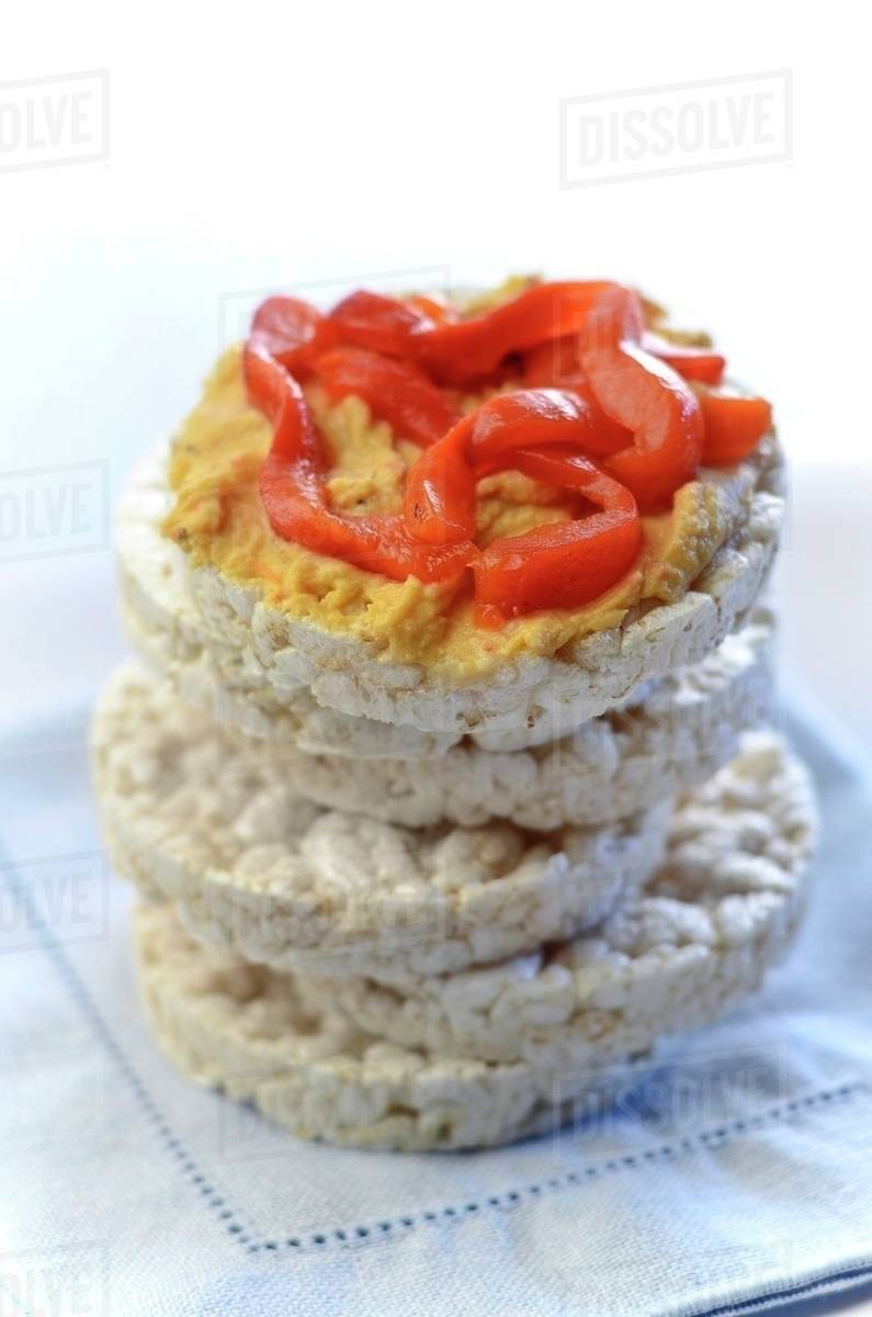 Stack of Rice Cakes with Top Cap Topped with Hummus and Roasted Red ...