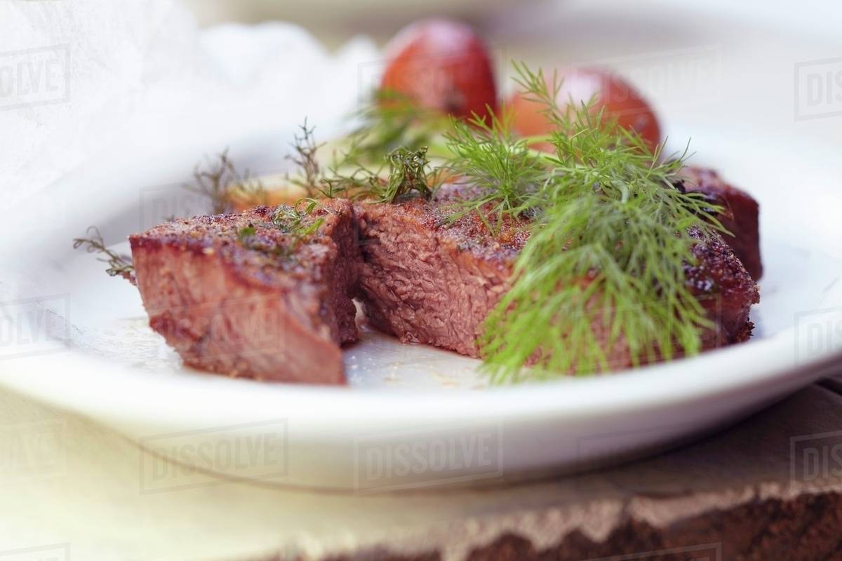 Steak with Fresh Dill and Potato on a White Plate - Royalty-free Stock ...