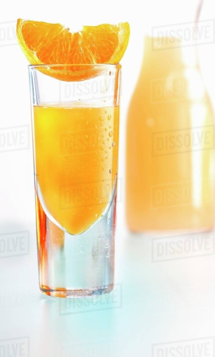 An orange juice shooter - Royalty-free Stock Photo | Dissolve