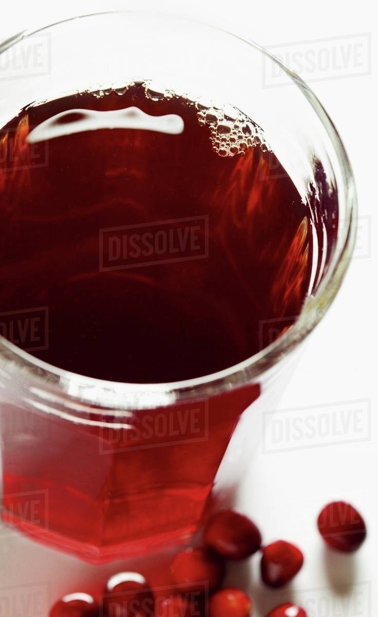 Cranberry juice in glass; fresh cranberries - Royalty-free Stock Photo ...