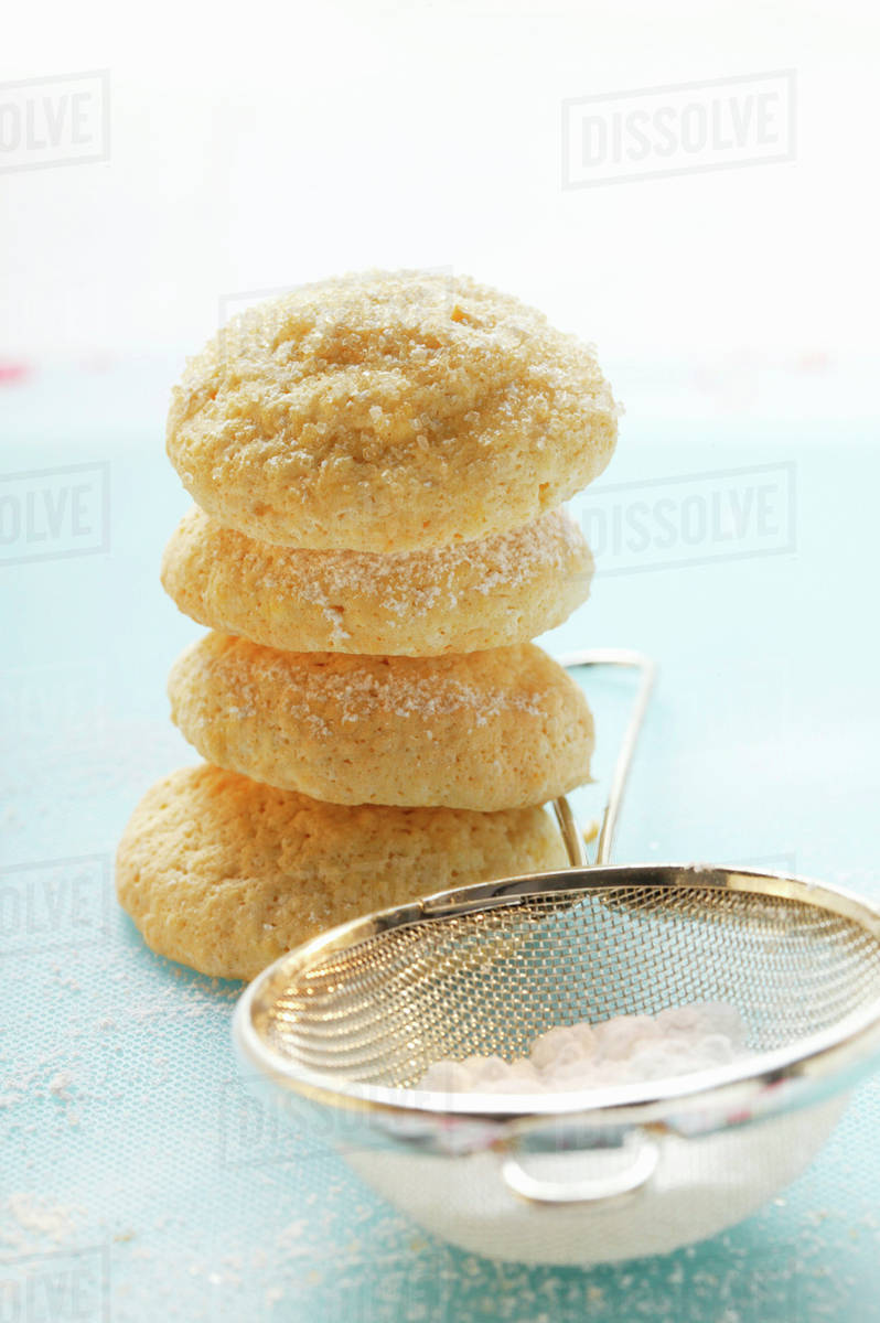 Sponge biscuits with icing sugar - Stock Photo - Dissolve