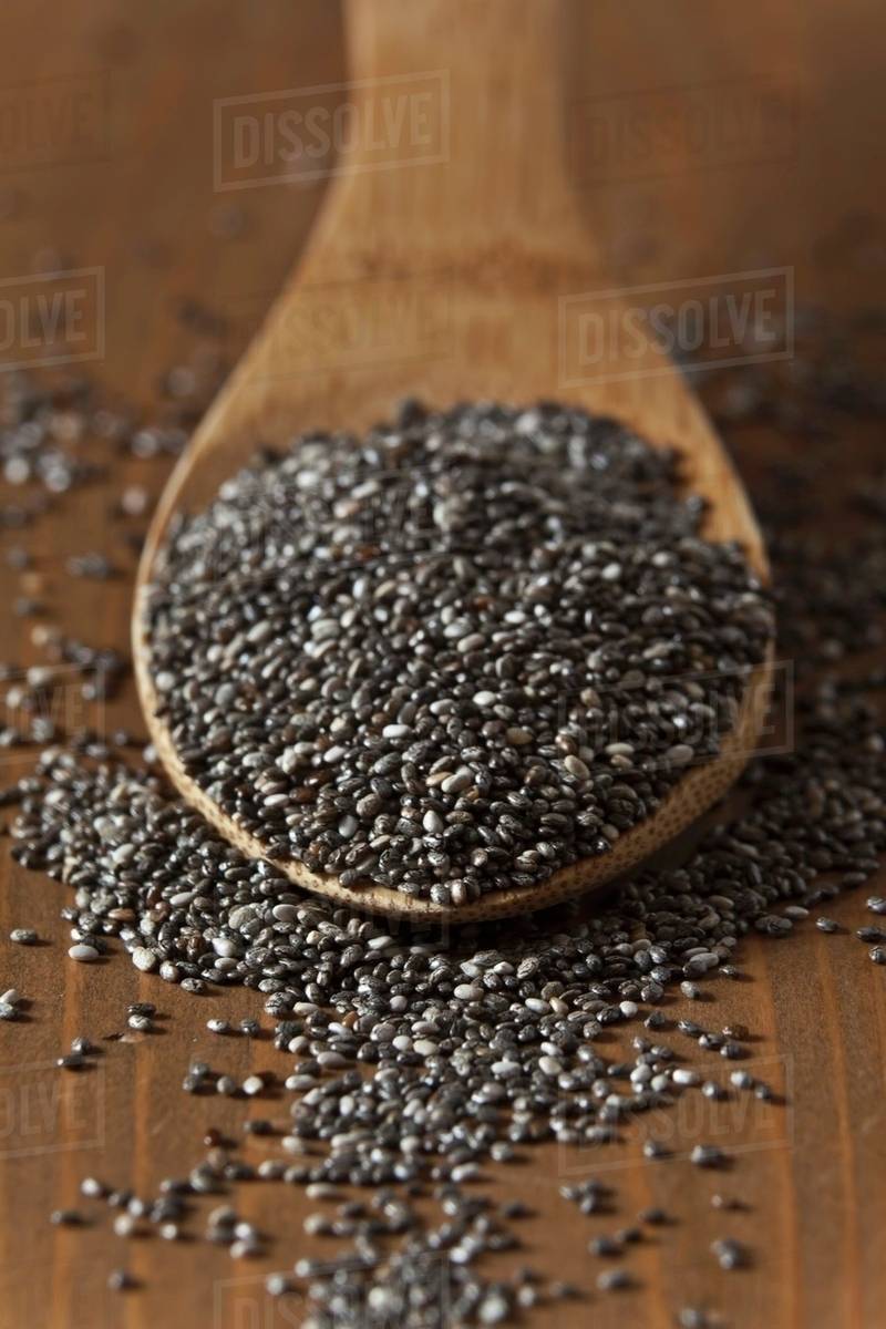 Chia Seeds on a Wooden Spoon - Royalty-free Stock Photo | Dissolve
