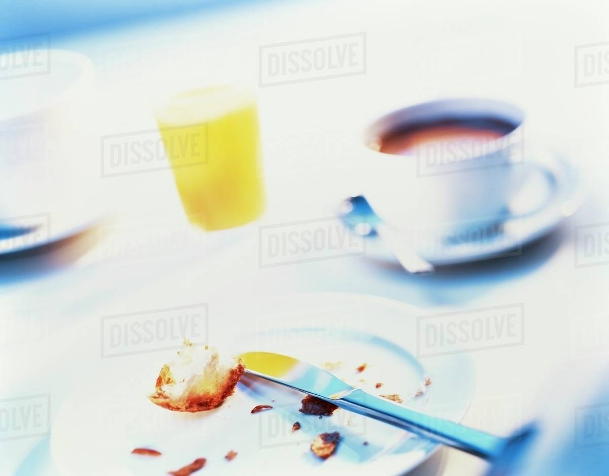 Leftover breakfast on a plate - Royalty-free Stock Photo | Dissolve