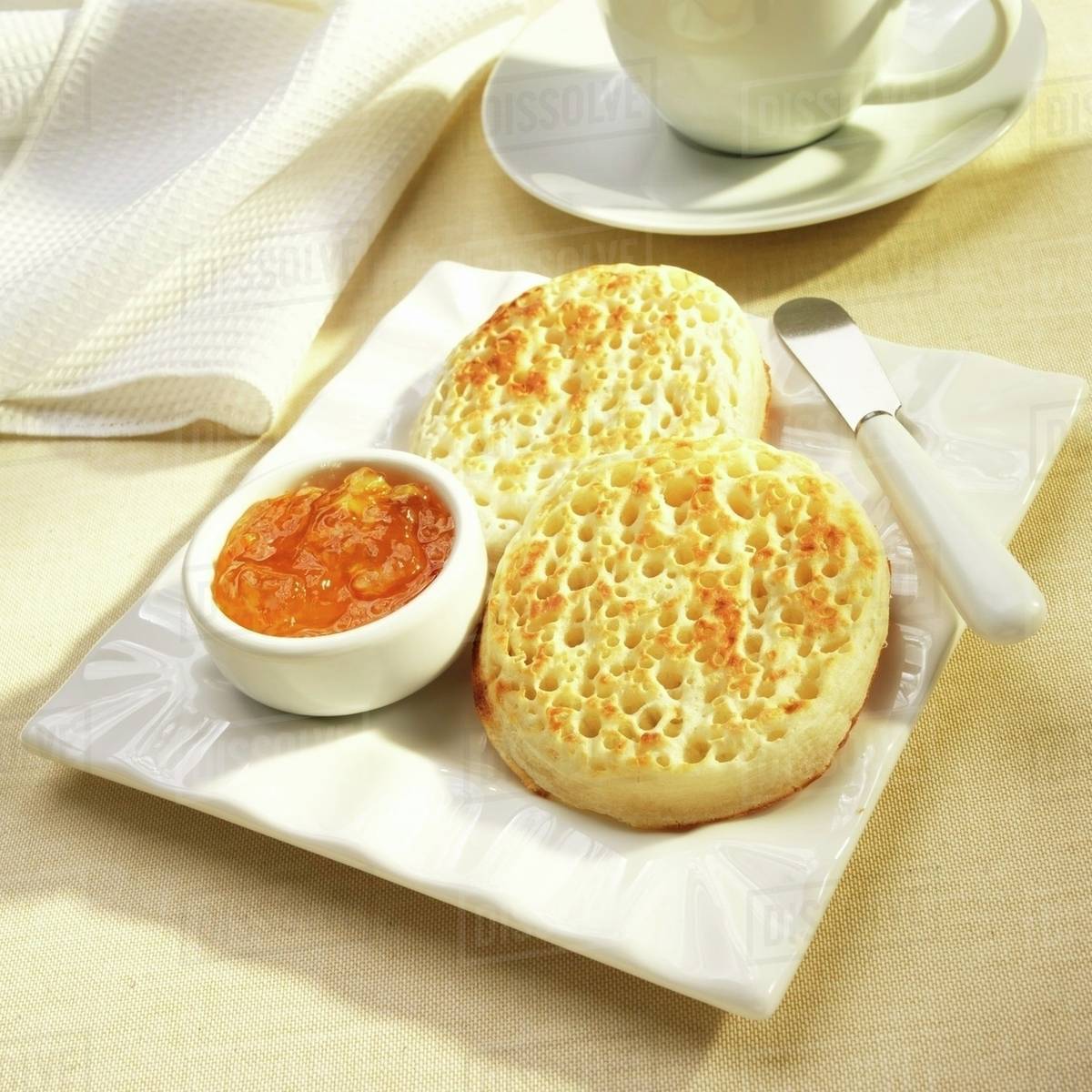 Toasted Crumpets with Orange Marmalade - Stock Photo - Dissolve