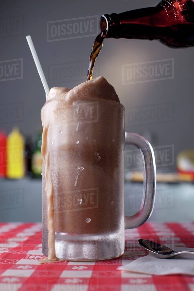 Root Beer Pouring into a Root Beer Float - Royalty-free Stock Photo ...