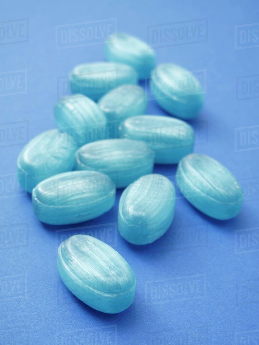 Blue cough sweets - Royalty-free Stock Photo | Dissolve