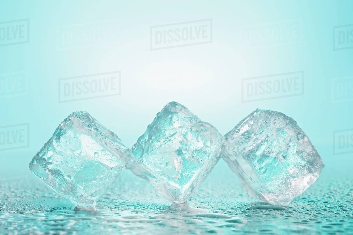 Three ice cubes - Royalty-free Stock Photo | Dissolve