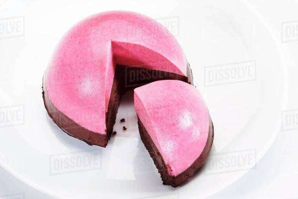 Raspberry Dome Cake on White Background - Stock Photo - Dissolve