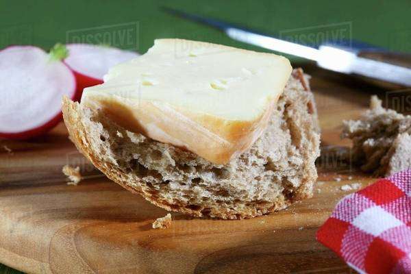 Limburg cheese on a slice of bread (close-up) - Royalty-free Stock ...