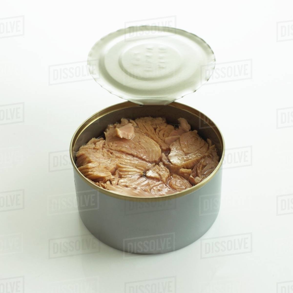 Tuna in opened tin - Royalty-free Stock Photo | Dissolve