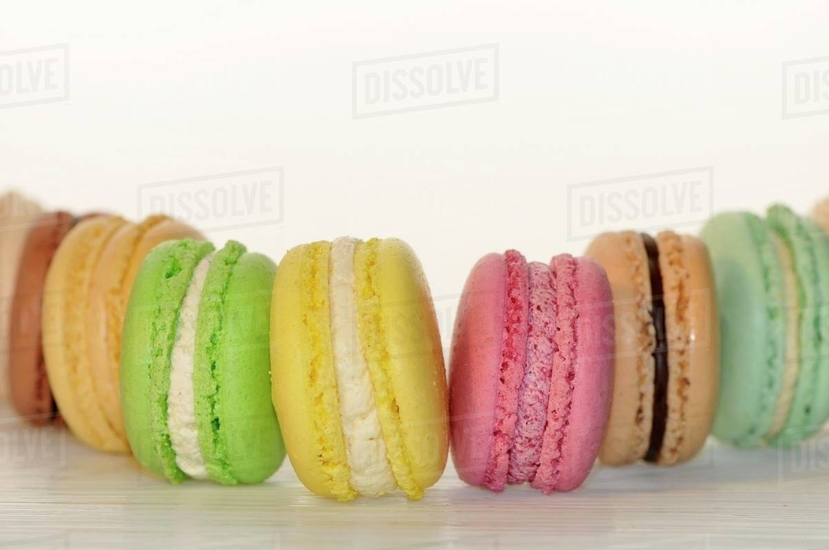 A row of different coloured macaroons - Royalty-free Stock Photo | Dissolve