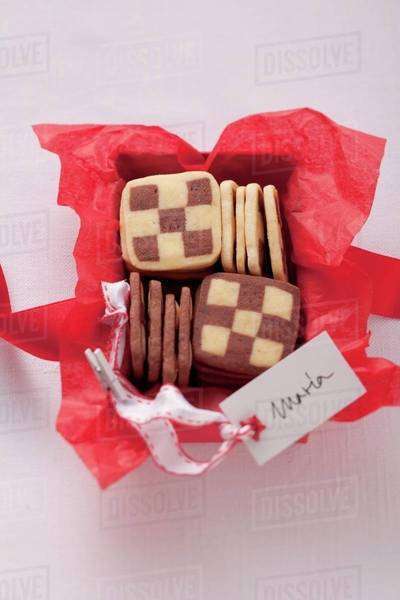 Black and white biscuits in a box as a gift - Stock Photo - Dissolve